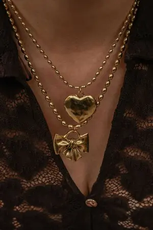 BEADS BY TARA Roxy Necklace Sculptural Bow Pendant In Antiqued