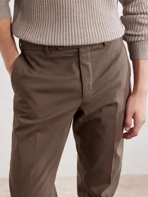 SLOWEAR Tapered Pleated Stretch-cotton Gabardine Suit Trousers