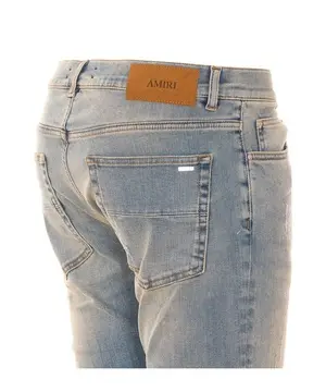 Amiri Mx1 Distressed Patch Jeans