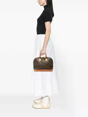 LOUIS VUITTON 1995 Monogram Alma Pm Handbag - Brown