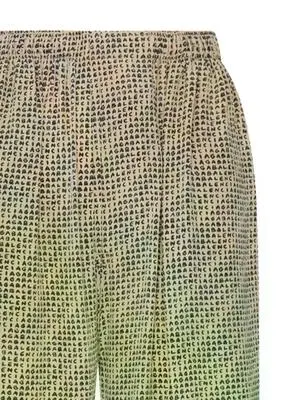 Balenciaga All-over Logo-print Silk Trousers - Neutrals