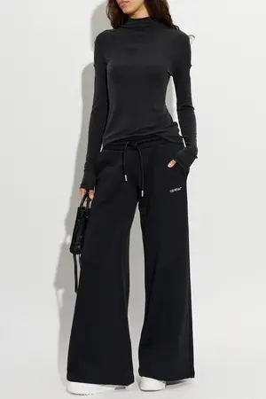 Off-White Ribbed Top With Decorative Cut-outs