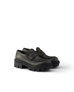 Prada Leather Loafers With Embossed Logo
