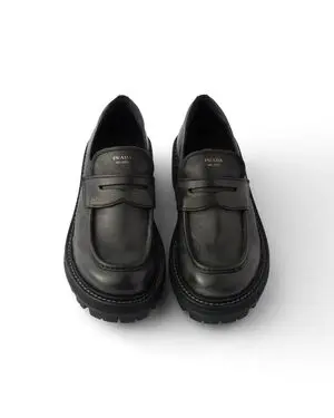 Prada Leather Loafers With Embossed Logo