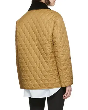 Burberry Quilted Jacket With Snap Buttons And Patch Pockets