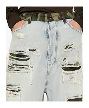 Amiri Repaired Baggy Jeans