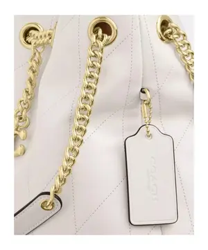 COACH Evelyn Shoulder Bag With Quilting And Charm