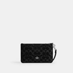 COACH OUTLET Ashton Wristlet In Signature Denim