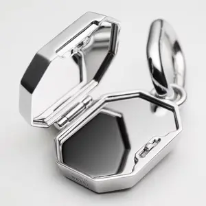 Celine Engraved Guilloche Box Charm In Rhodium-plated Brass