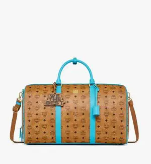 Mcm X We The Best Ottomar Weekender Bag In Visetos - Cognac
