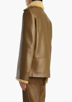 Khaite Marlotte Double-breasted Lambskin Coat With Shearling Trim