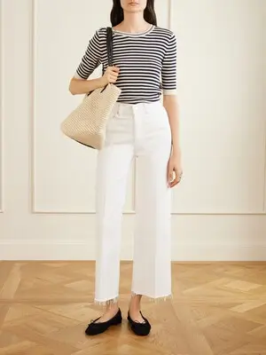 FRAME High Rise Wide Leg Jeans With Frayed Hem