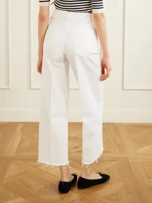 FRAME High Rise Wide Leg Jeans With Frayed Hem