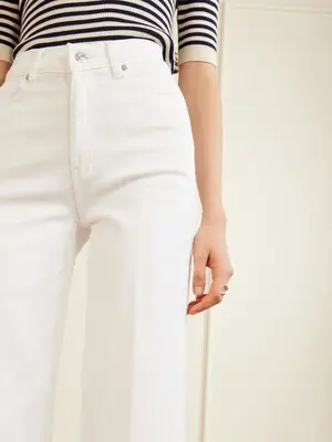 FRAME High Rise Wide Leg Jeans With Frayed Hem
