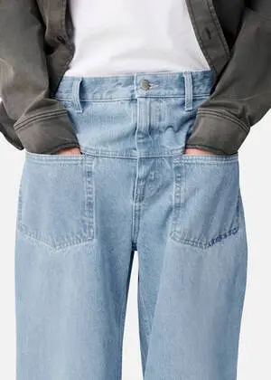 Axel Arigato Invert Relaxed Jeans In Light Wash Denim