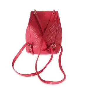 Chanel Red Quilted Calfskin Covered Cc Drawstring Backpack - Pink