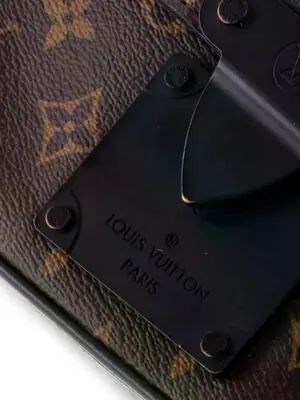 LOUIS VUITTON Monogram Canvas Lock Sling Bag