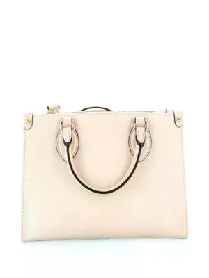 LOUIS VUITTON Onthego Pm Monogram Empreinte Giant Shoulder Bag - Neutrals
