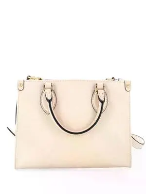 LOUIS VUITTON Onthego Pm Monogram Empreinte Giant Shoulder Bag - Neutrals