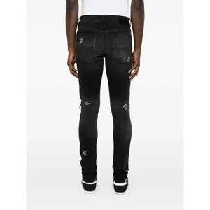 Amiri Distressed Jeans With Vintage Effect