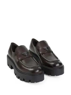 Prada Distressed Leather Loafers