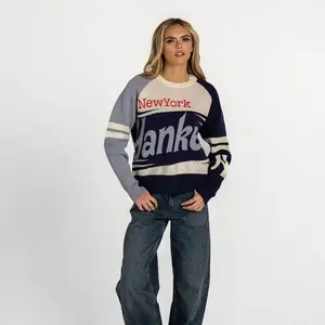SWEATERS