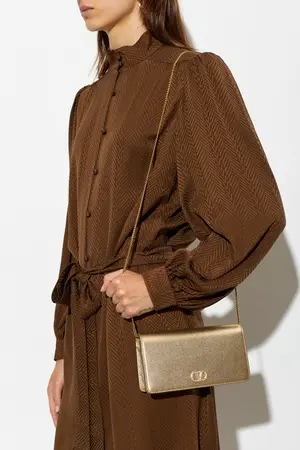 Valentino Garavani Leather Clutch With Crystal Embellished Logo