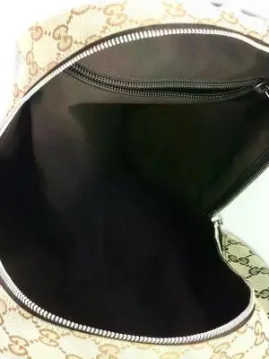 Gucci Zip Around Travel Gg Canvas Backpack