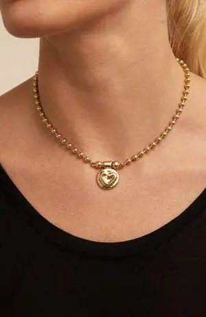 UNODE50 18k -plated Metal Heart Charm Pendant