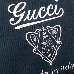 Gucci Logo Printed Zip-up Backpack