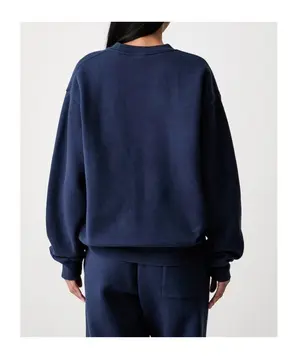 SPORTY  RICH Sporty & Rich Crewneck Long Sleeve Sweatshirt