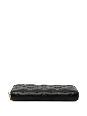 LOUIS VUITTON 2021-2026 Monogram Embossed Lambskin Coussin Zippy Wallet Long Wallets