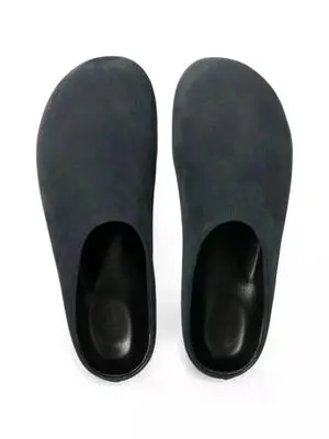 Studio Nicholson Wearing Leather Clogs