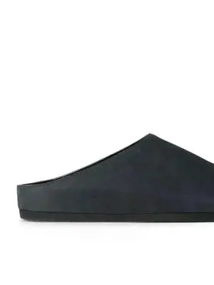 Studio Nicholson Wearing Leather Clogs