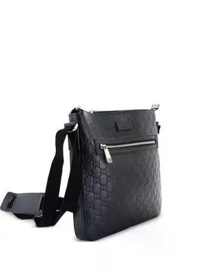Gucci Signature Embossed Leather Messenger Bag