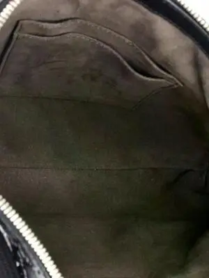 Gucci Signature Embossed Leather Messenger Bag