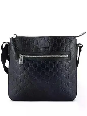 Gucci Signature Embossed Leather Messenger Bag