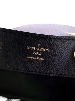 LOUIS VUITTON Lockme Leather Mini Backpack