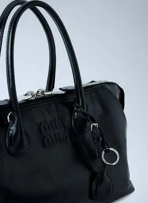 Miu Miu Patent Leather Top Handle Bag With Embossed Detailing - Black