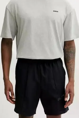 Under Armour Unstoppable Woven Logo-print Elasticated-waist Shorts - Black