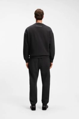 Hugo Relaxed-fit Cotton Jogger Pants With Streetwear Logo