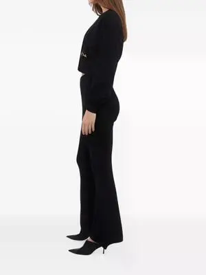 IZAAK AZANEI Ribbed-knit Flared Trousers