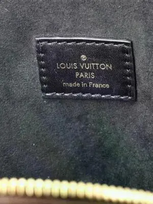 LOUIS VUITTON Monogram Canvas Toupie Handbag