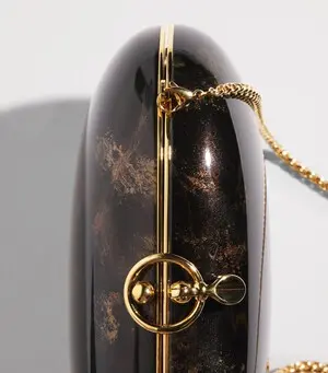 Jeffrey Levinson Oval Elina Clutch Bag