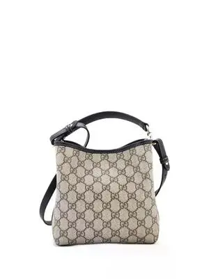 Gucci Gg Emblem Gg Coated Canvas Small Bucket Bag - Black