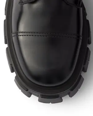 Prada Monolith Leather And Re-nylon Booties With Pouch