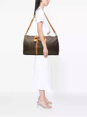 LOUIS VUITTON Monogram Keepall Bandouliere 55 Travel Bag - Brown