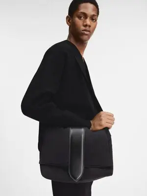 Jacquemus Logo Embossed Messenger Bag