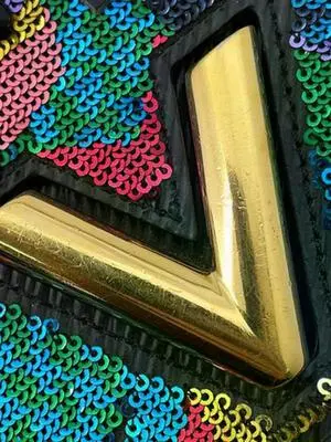 LOUIS VUITTON Sequin Bird Twist Clutch Bag