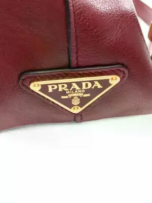 Prada 2000s Logo-embossed Leather Handbag